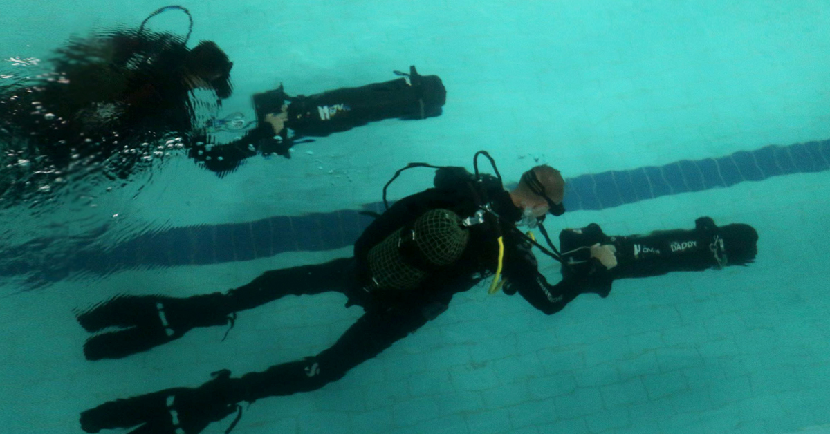 Like underwater rocket! SpecOps divers master handling speedy scooters ...